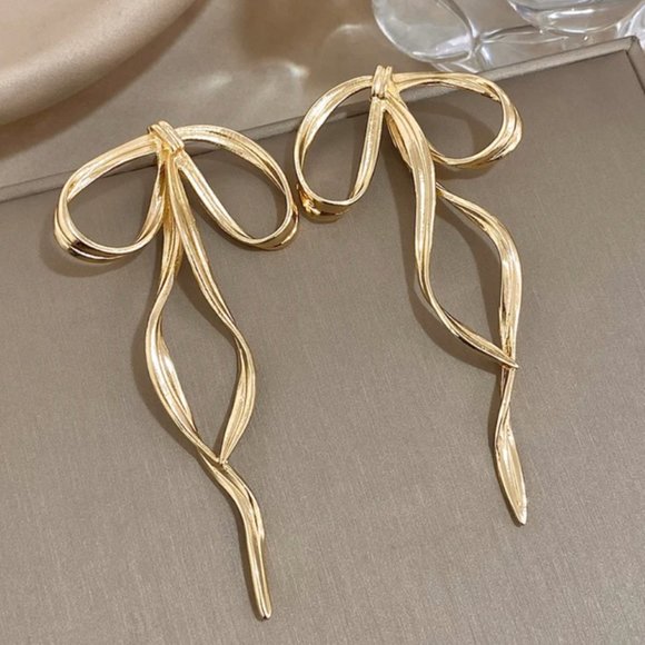 Anthropologie | Jewelry | New Bow Wavy Earrings | Poshmark